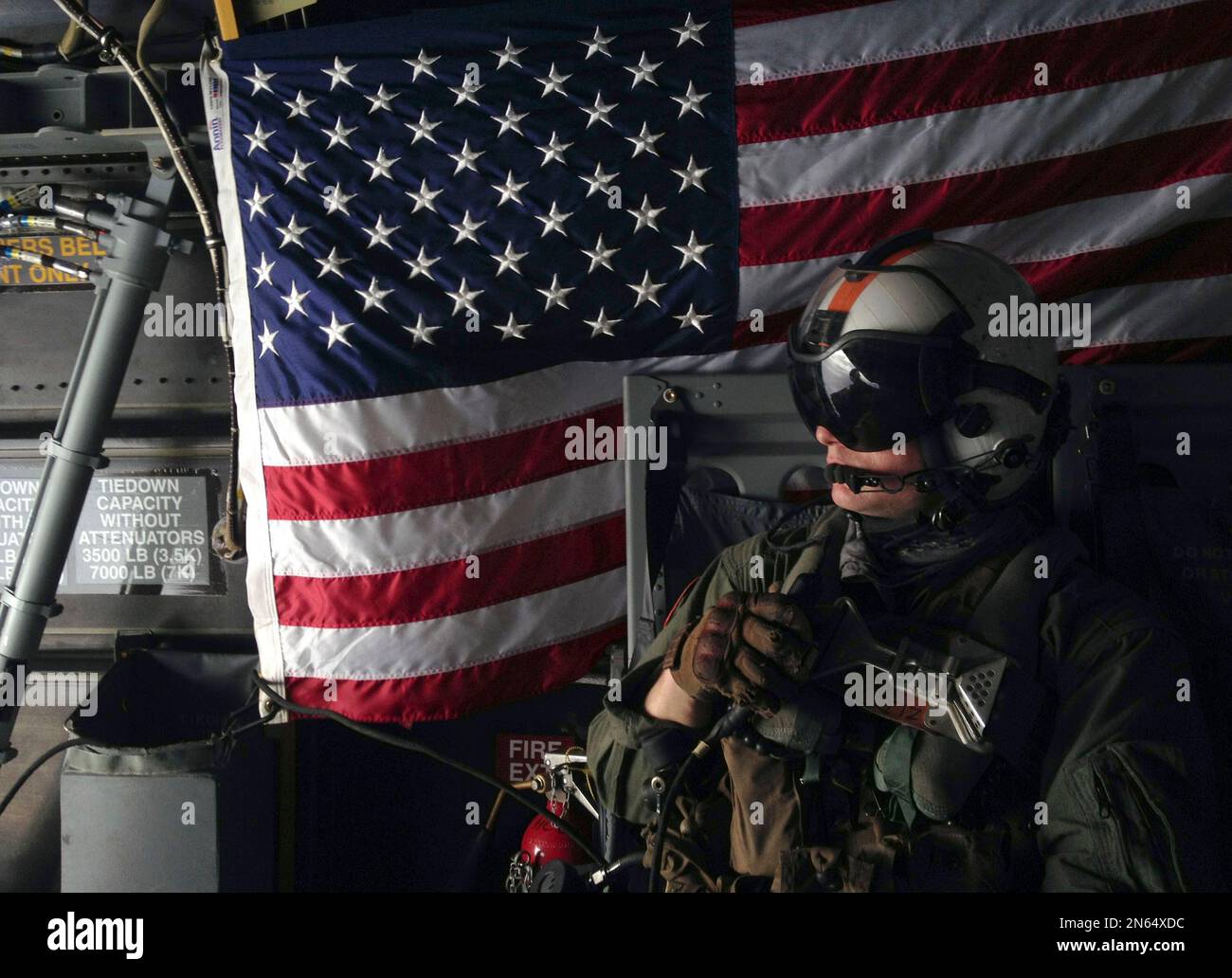 In this Nov. 19, 2013 photo, Osprey crew chief Cpl. Zachary Lyon, 23 ...