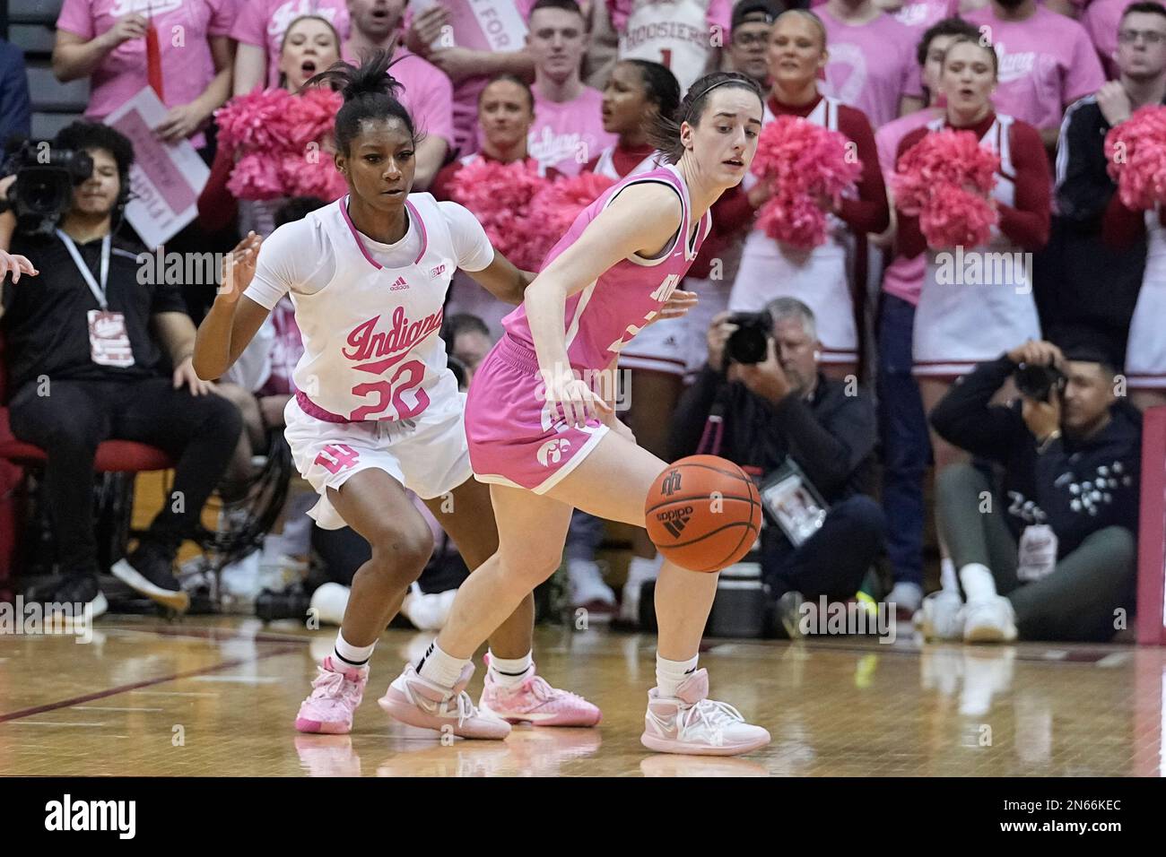 Indiana's Chloe Moore-McNeil (22) and Iowa's Caitlin Clark (22) vie for ...