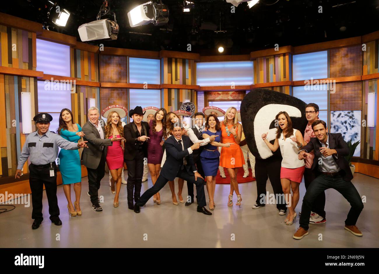 Hosts of the ABC network's "Good Morning America," show the Univision ...