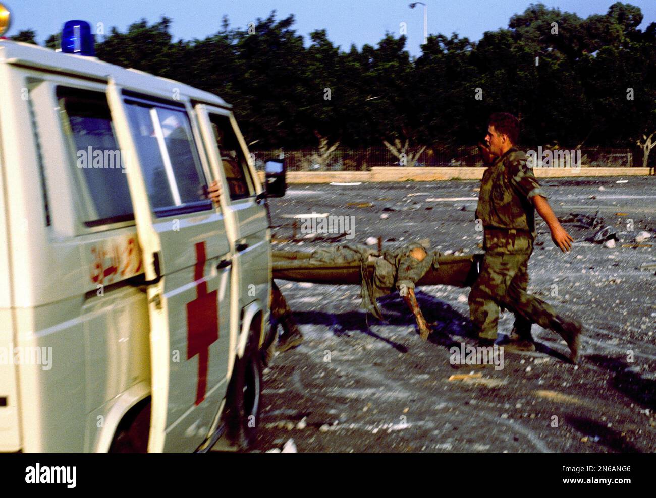 FILE - In this Sunday, Oct. 23, 1983, file photo, an injured service ...