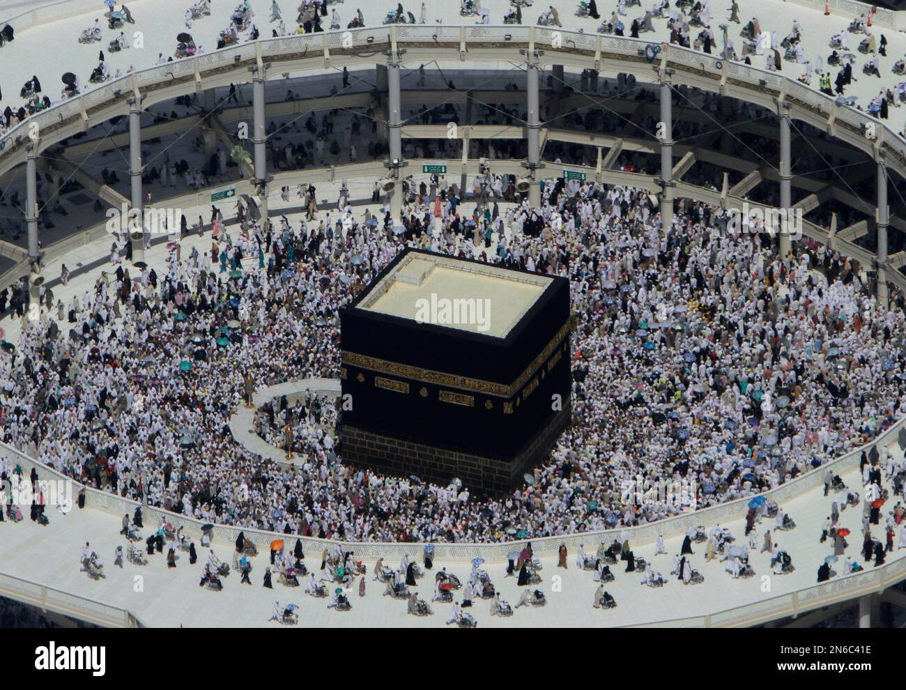 This aerial image made from a helicopter shows Muslim pilgrims circle ...