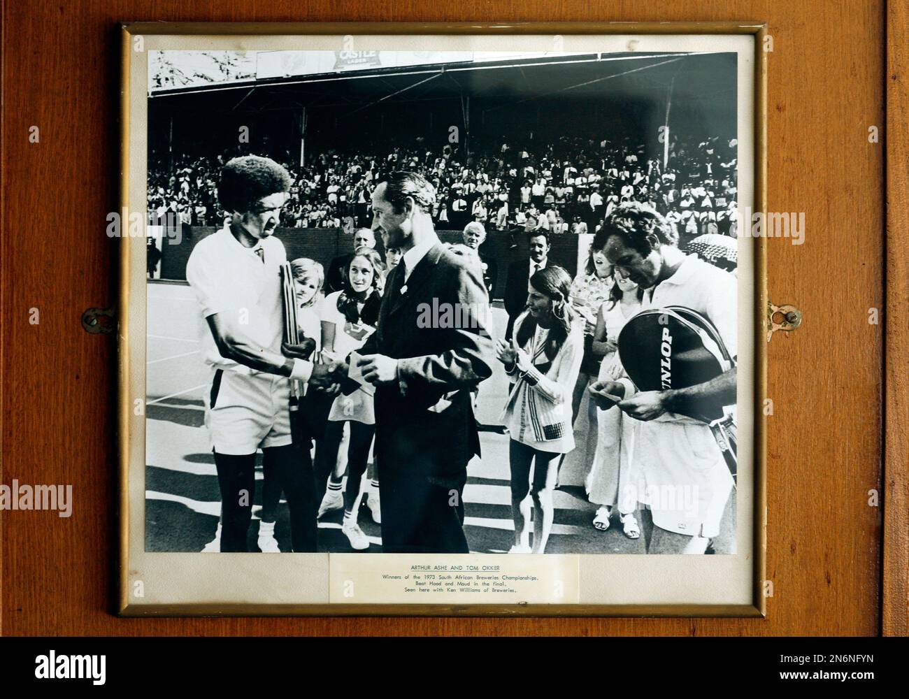 A framed photograph dated 1973, of US tennis player Arthur Ashe, left ...