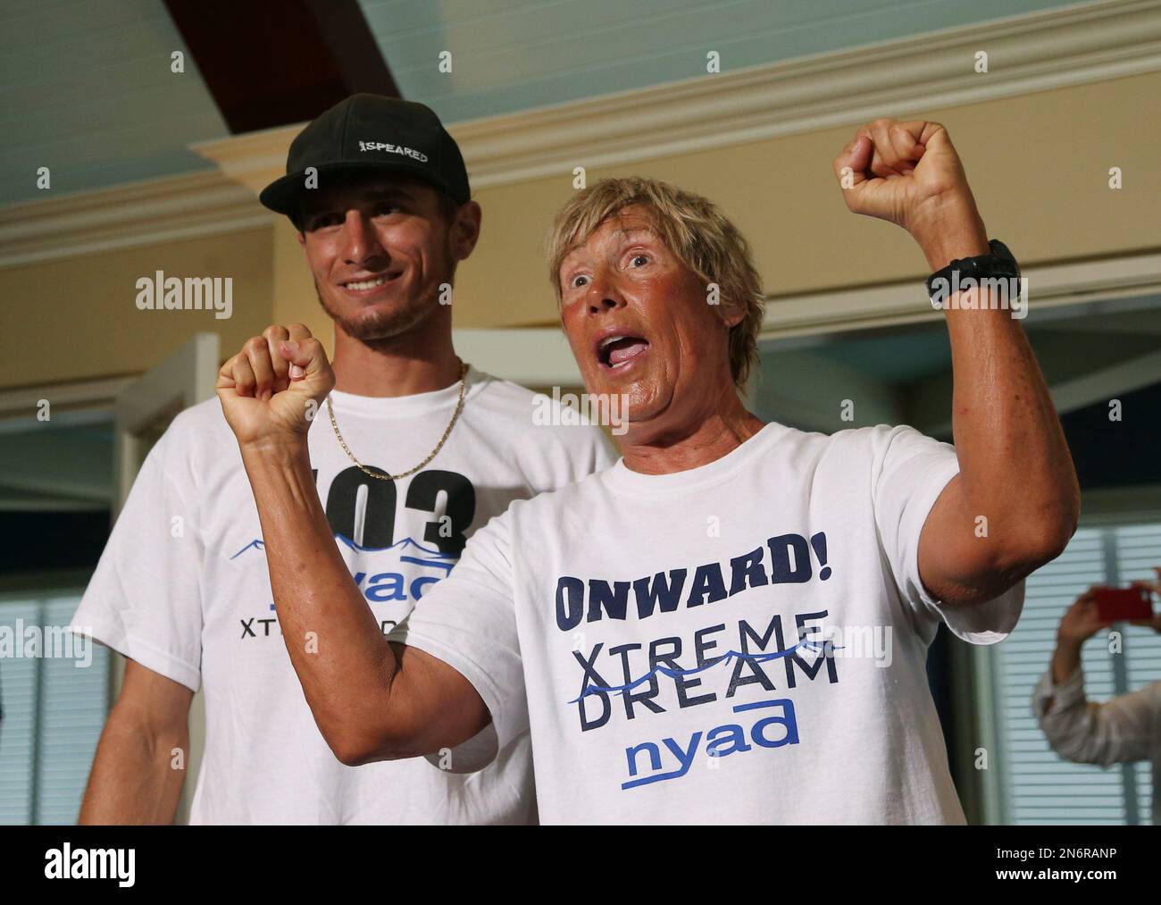 United States endurance swimmer Diana Nyad, right, and one her shark ...