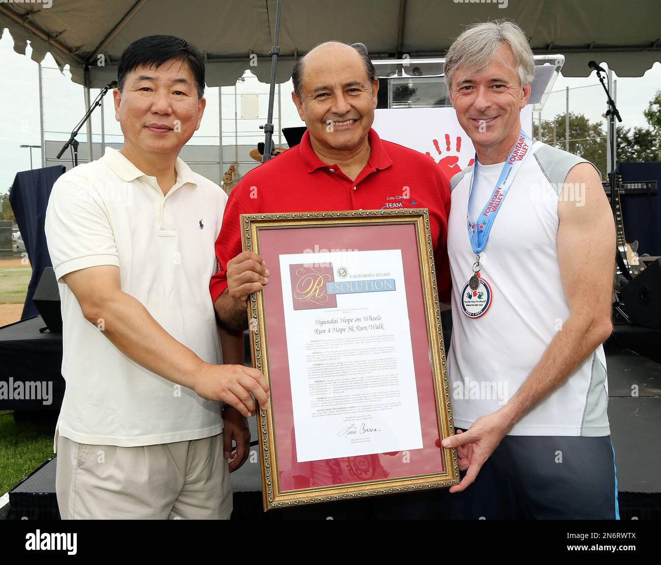 From left, B.H. Lee, Chief Executive Coordinator Hyundai Motor America ...