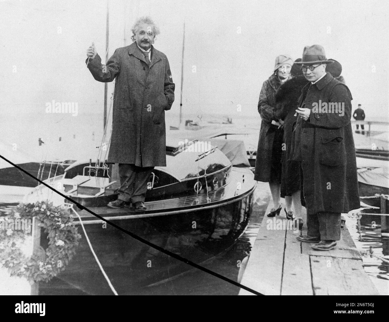 Prof. Albert Einstein, famous scientist, poses with sailboat presented ...
