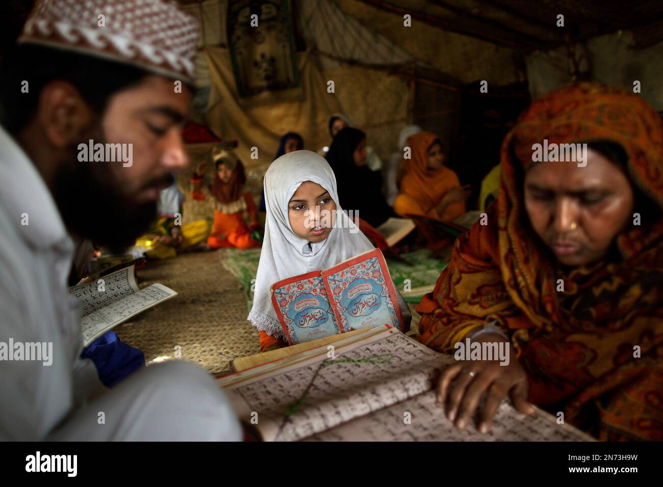 In this Tuesday, April 2, 2013 photo, Pakistani woman, Halimah Tajj, 51 ...