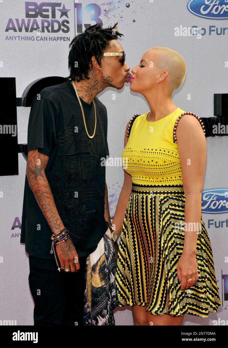 Wiz Khalifa, left, and Amber Rose kiss at the BET Awards at the Nokia Theatre on Sunday, June 30 ...