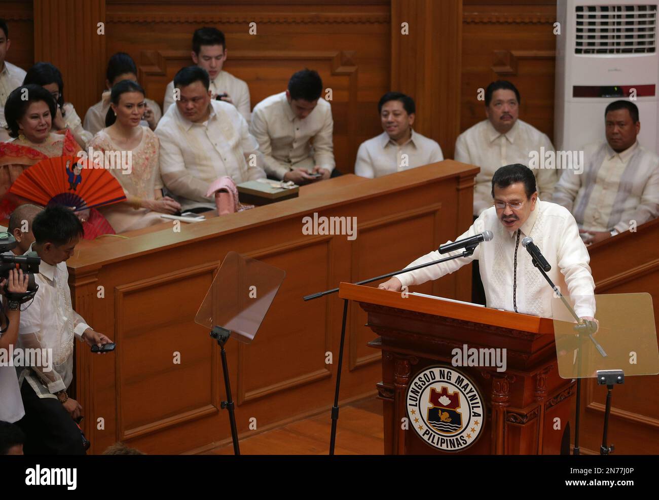 Former Philippine President Joseph Estrada, right, addresses the crowd ...