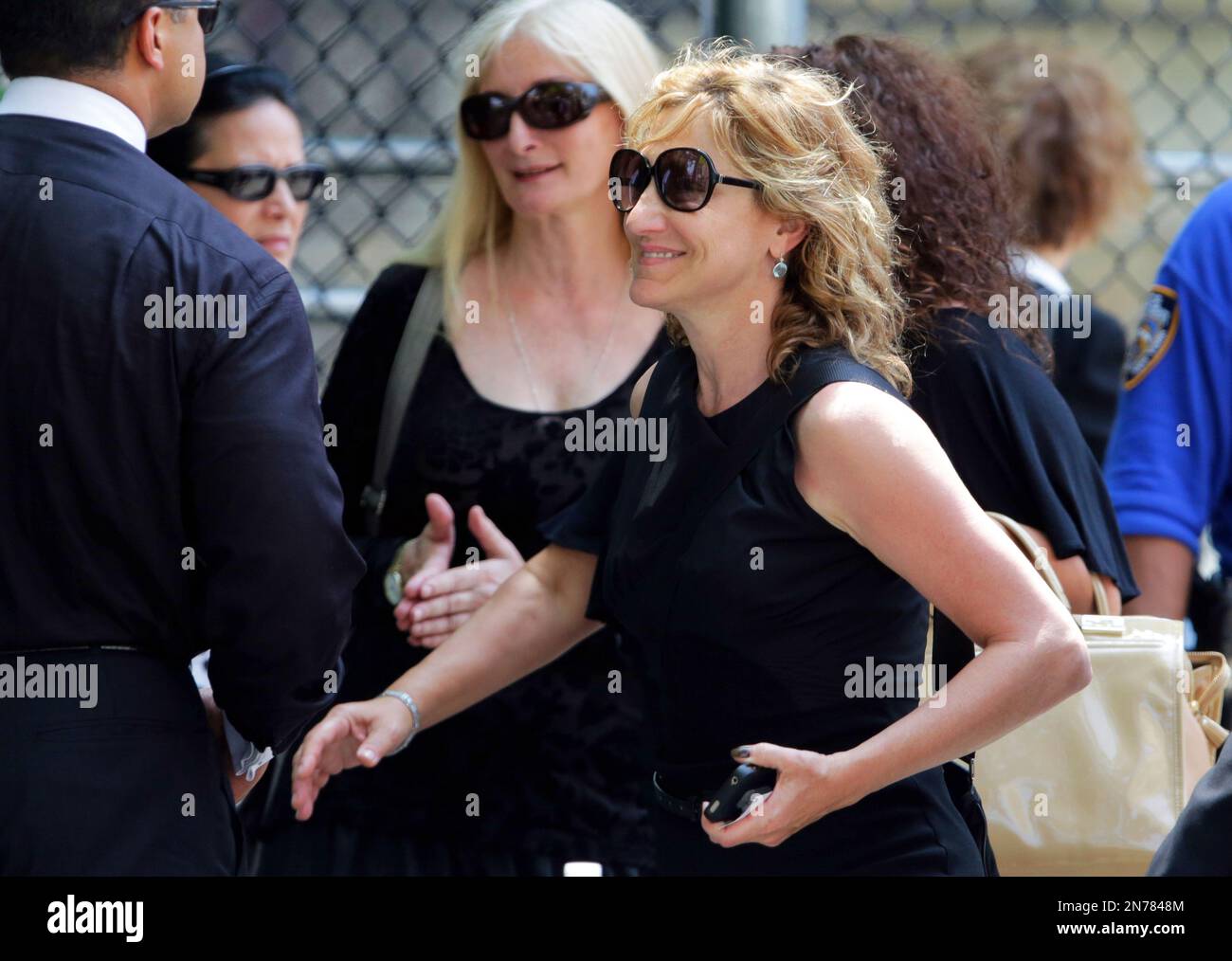 Actress Edie Falco leaves the funeral service of James Gandolfini, star ...