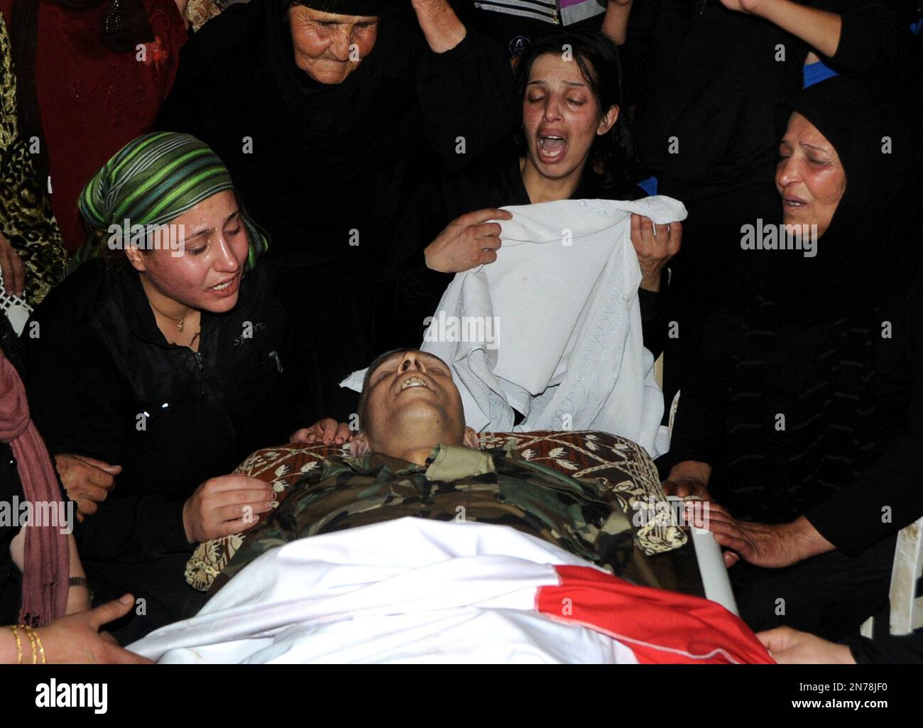 Relatives of Lebanese army Sergeant Abdul Karim Kabalan el-Teimy who ...