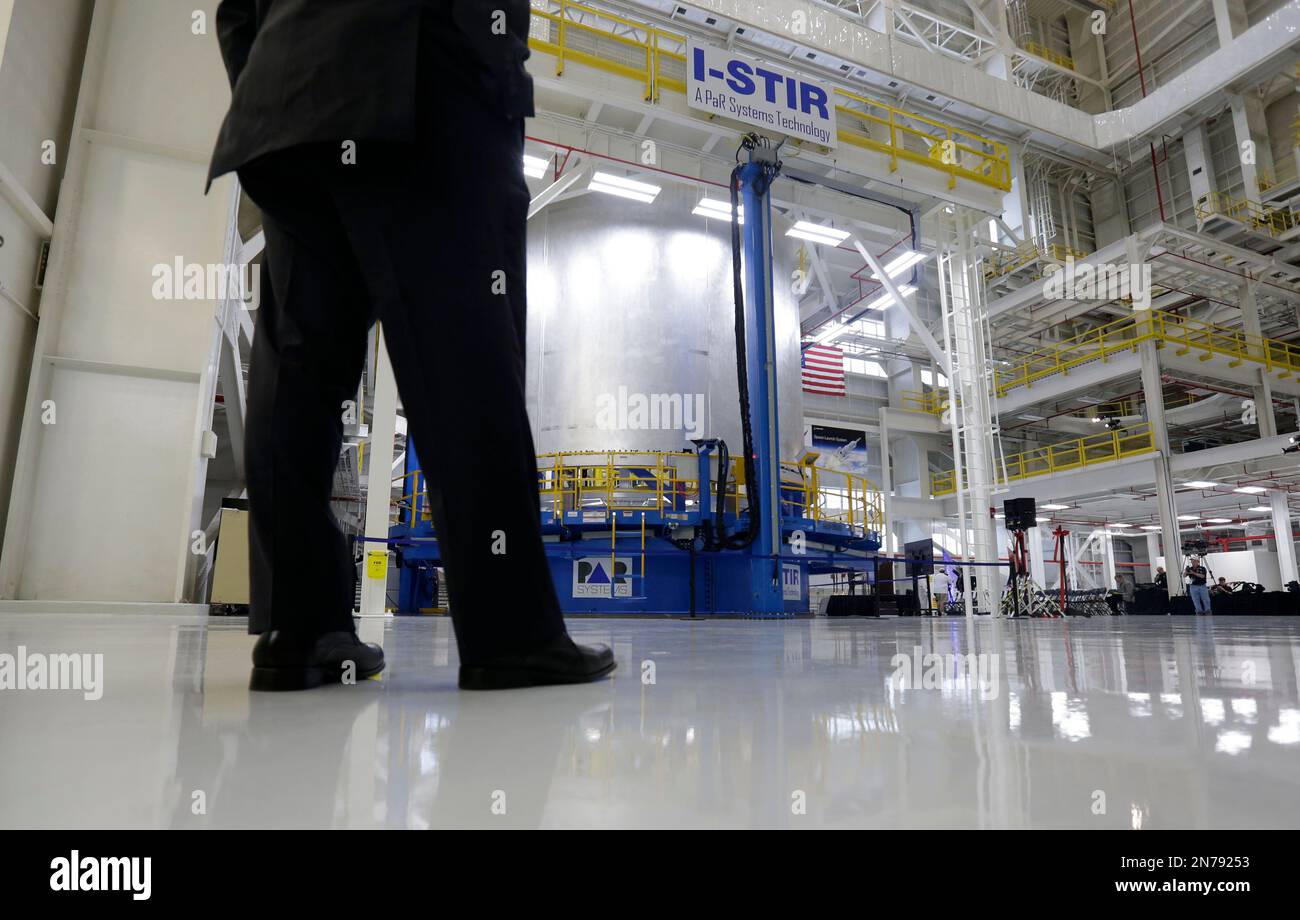 Executives look at the new vertical weld center at NASA's Michaud ...