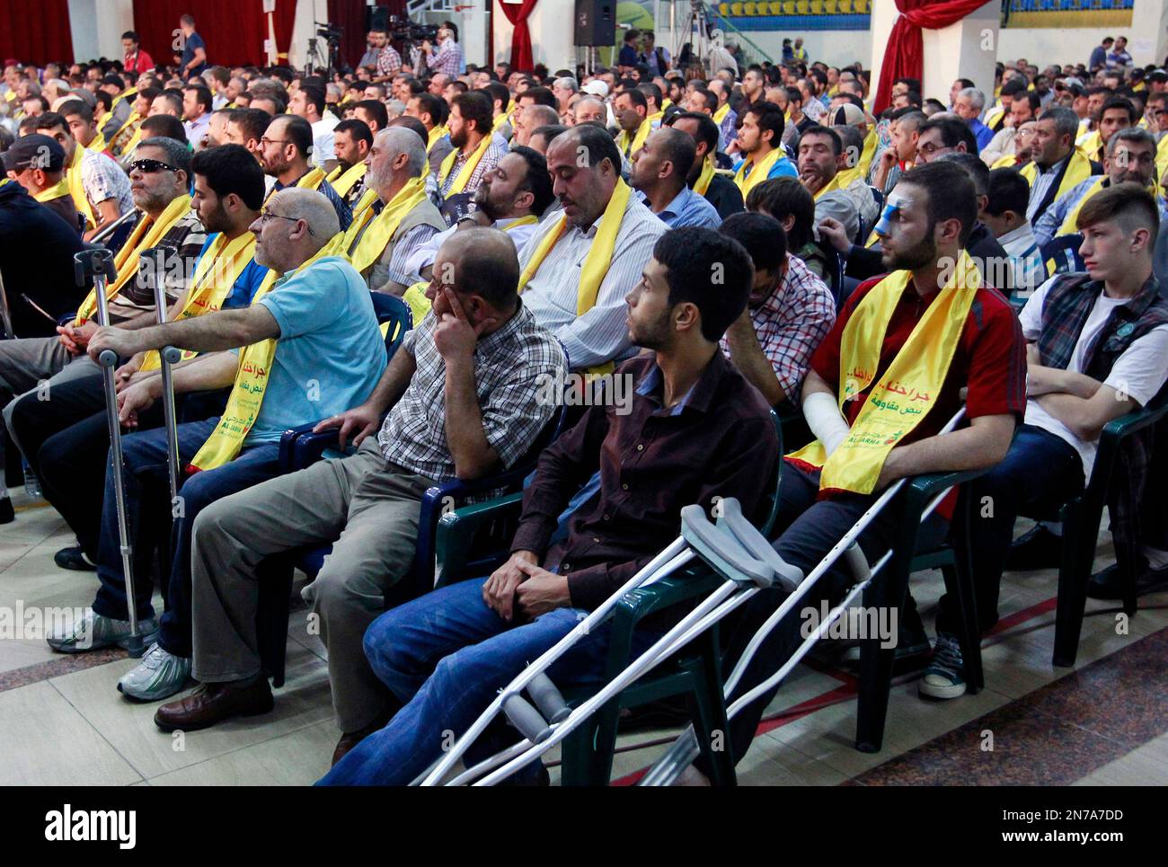 Injured Hezbollah fighters listen to a speech by Hezbollah leader Sheik ...