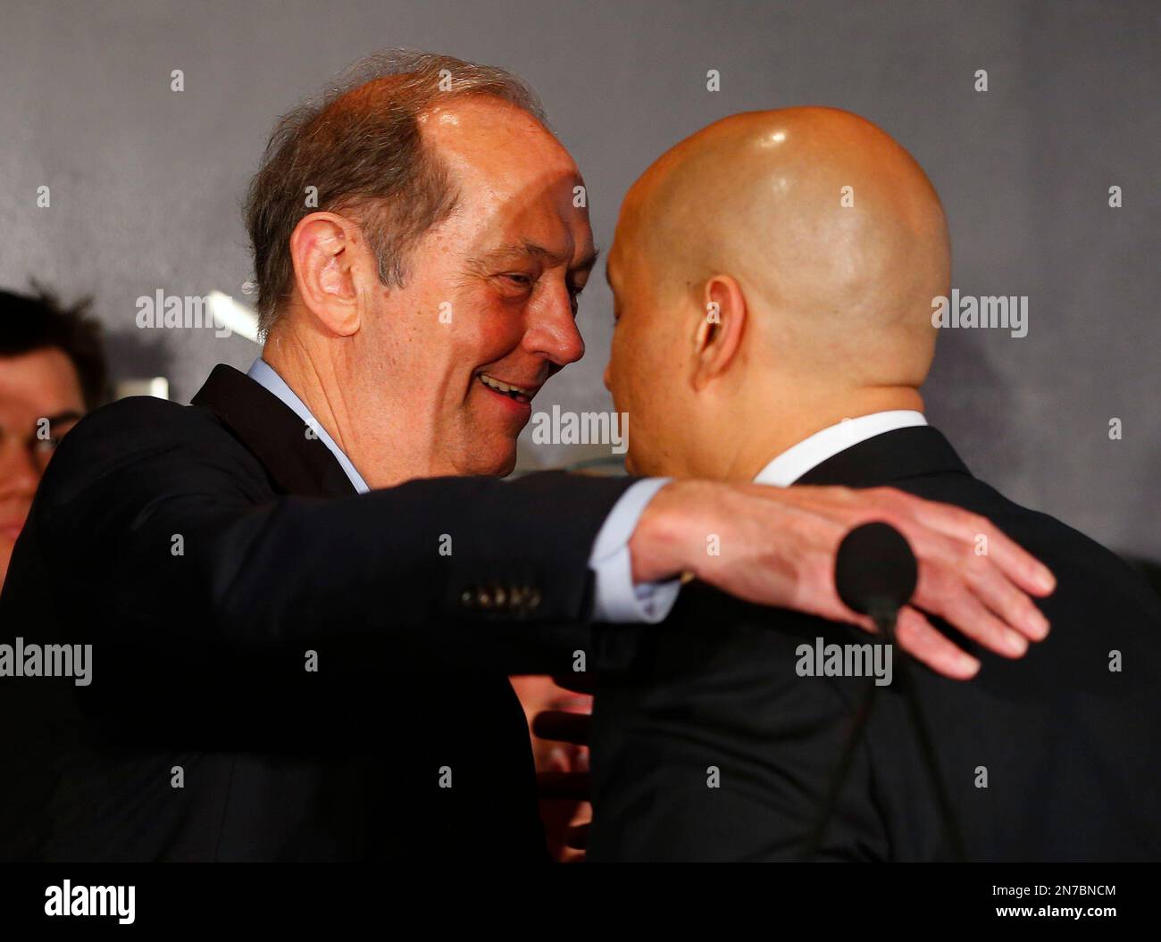 Former Sen. Bill Bradley embraces Newark Mayor Cory Booker after Booker ...