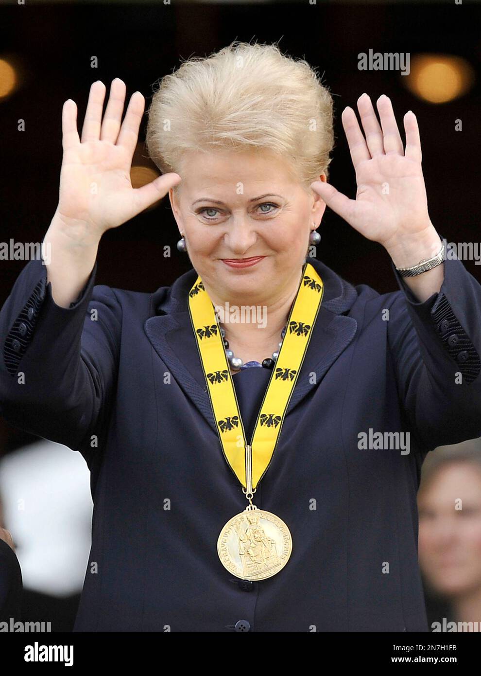 Lithuania's president Dalia Grybauskaite waves from the balcony after ...