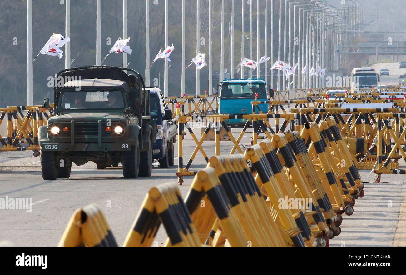 A South Korean military vehicle crosses Unification bridge, which leads ...