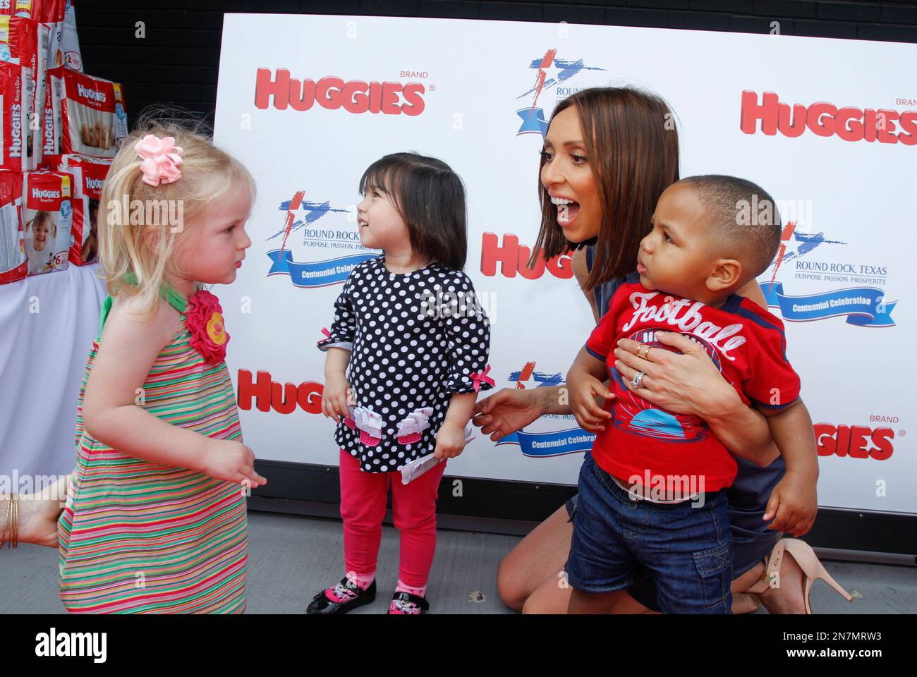IMAGE DISTRIBUTED FOR HUGGIES - Giuliana Rancic, right, holding 1-year ...