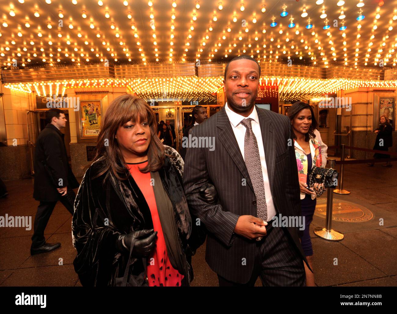 Roger Ebert's wife Chaz Ebert, left, and actor Chris Tucker, right ...