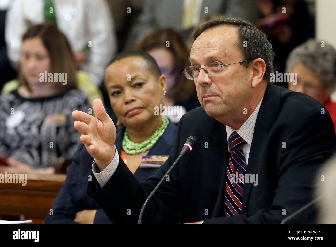 Sen. Joyce Elliott, D-Little Rock, left, watches a s Jerry Cox of ...