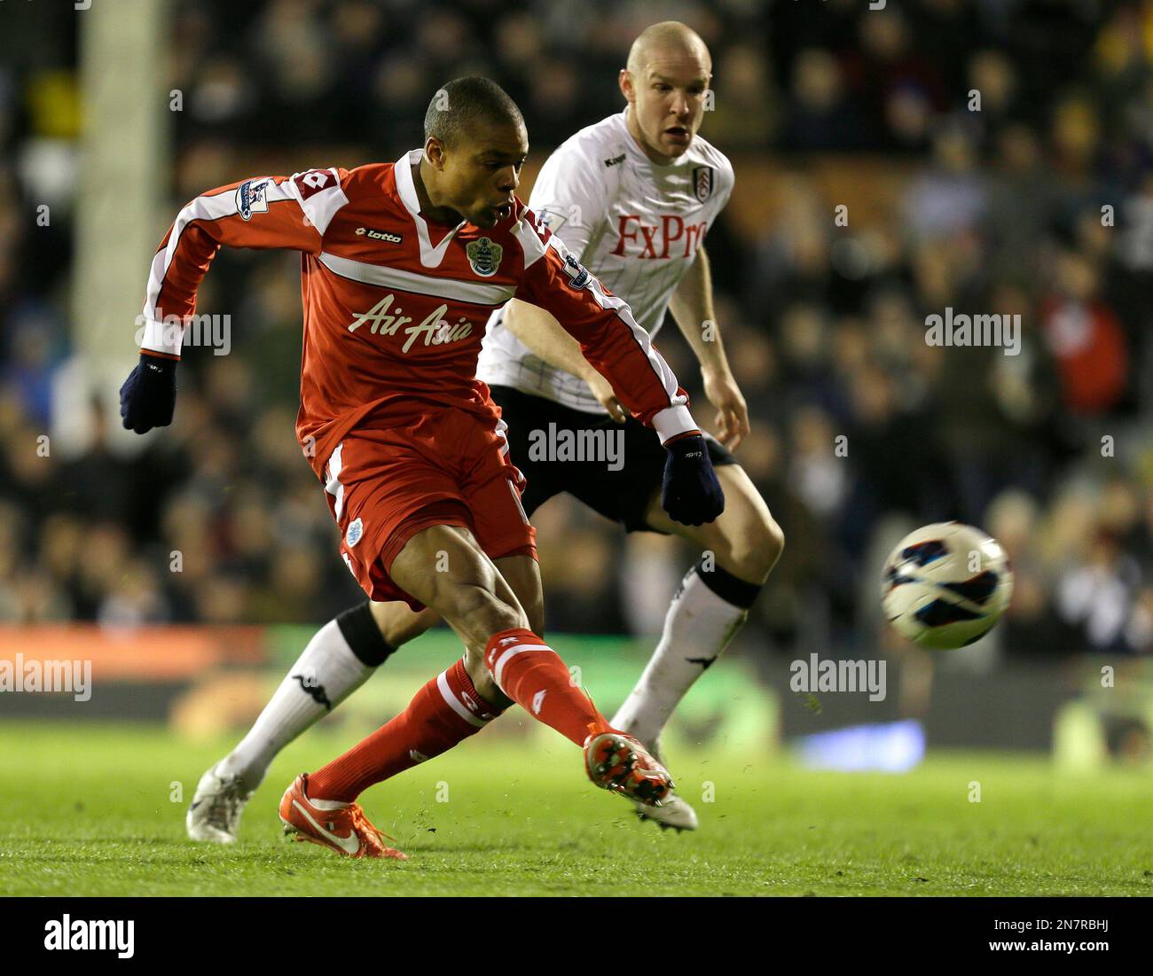 Queens Park Rangers' Loic Remy shoots and scores a goal against Fulham ...