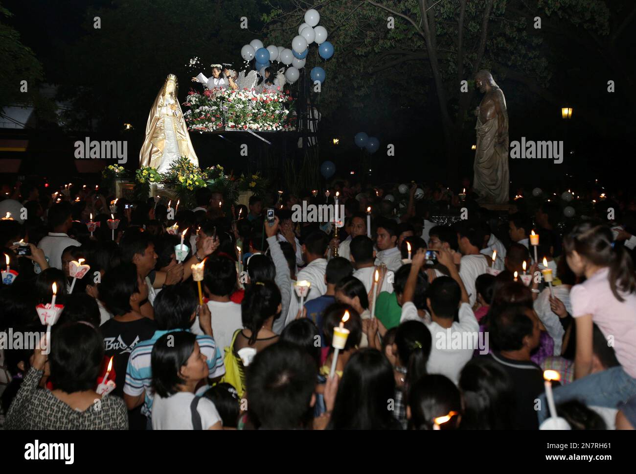 Filipino devotees gather during the traditional Easter Sunday ritual of ...