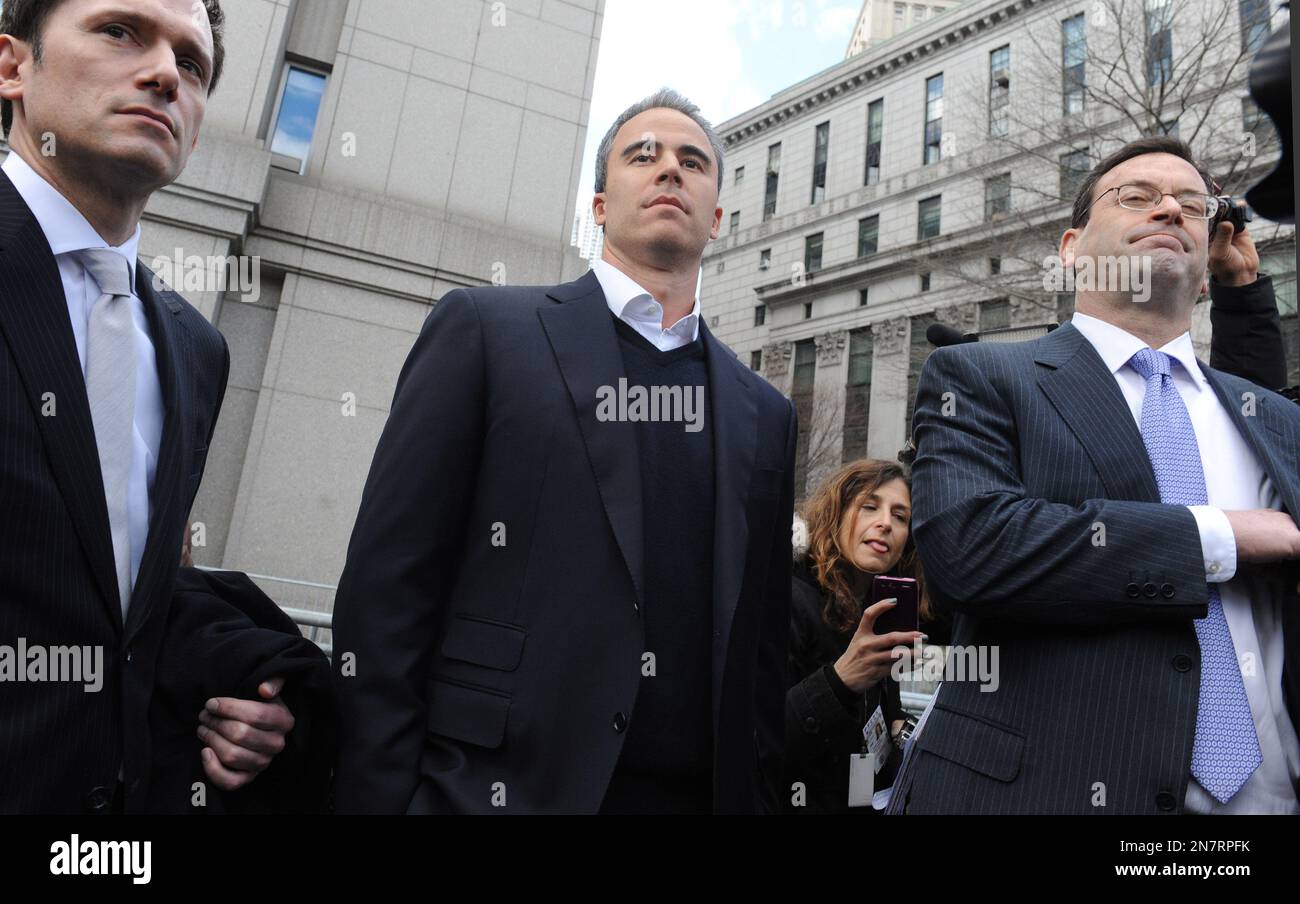 Michael Steinberg, center, exits Manhattan federal court with his ...