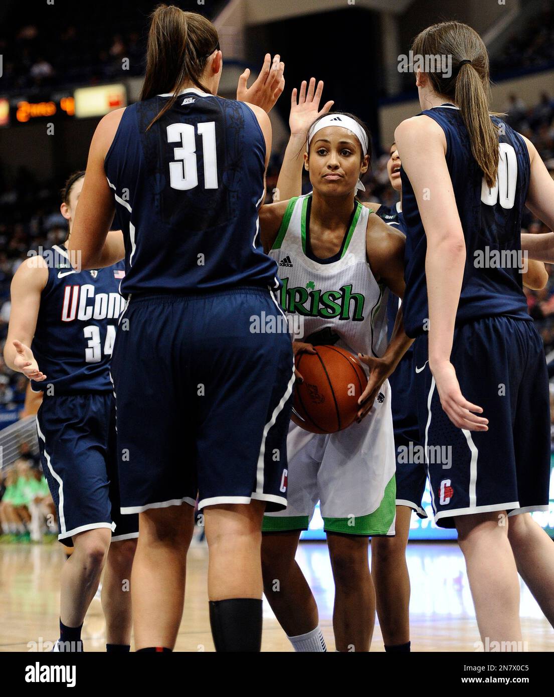 Notre Dame's Skylar Diggins center emerges from a team huddle of ...