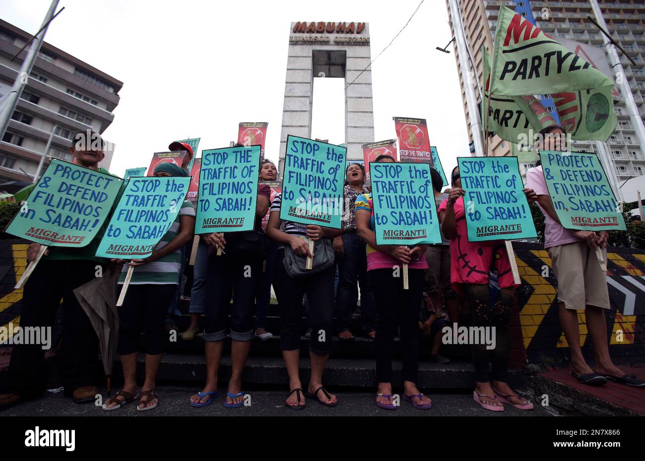 Filipino activists shout slogans during a rally in Manila, Philippines ...