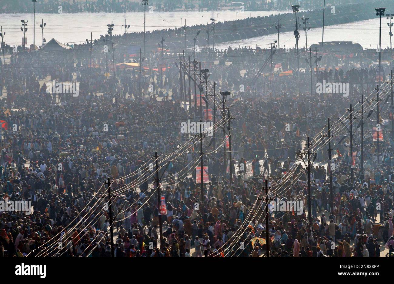 Indian devotees take holy dips at Sangam, the confluence of the Rivers ...
