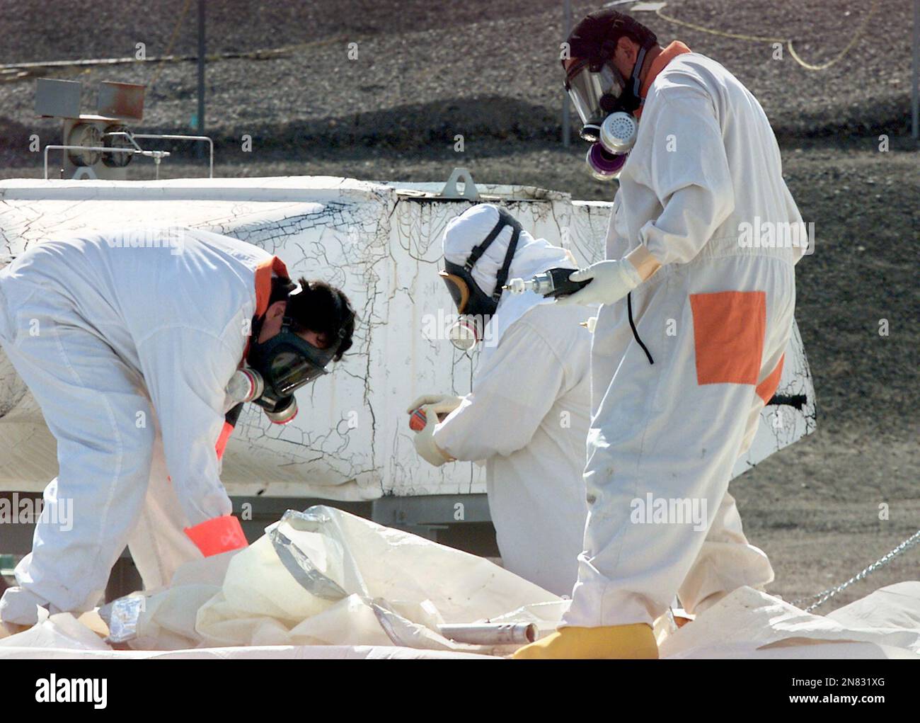 FILE -- In this March 23, 2004 file photo, workers at the tank farms on ...