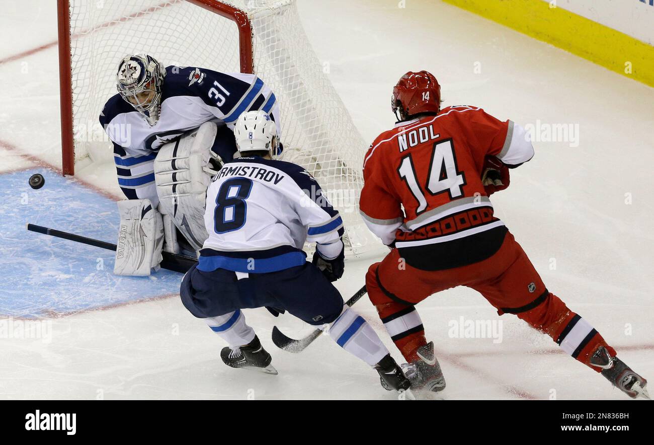 Carolina Hurricanes' Andreas Nodl (14), of Austria, tries to score as ...