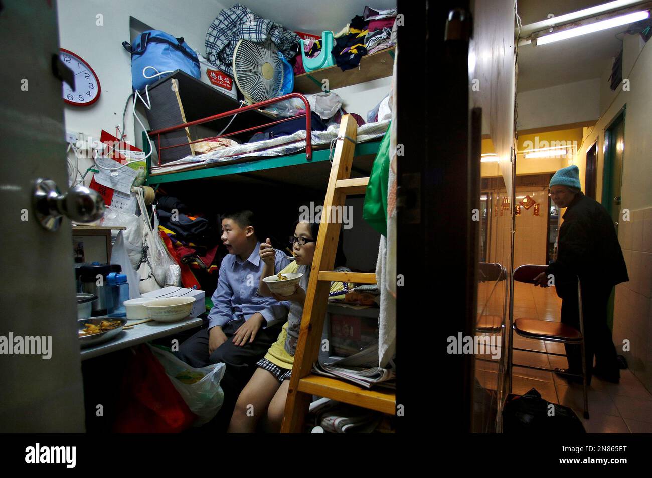 In this Jan. 25, 2013 photo, 63-year-old Lee Tat-fong, walks in a ...