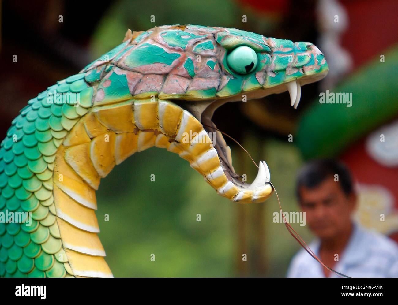 An ethnic Chinese Malaysian walks at Thean Hock Keong temple, also ...