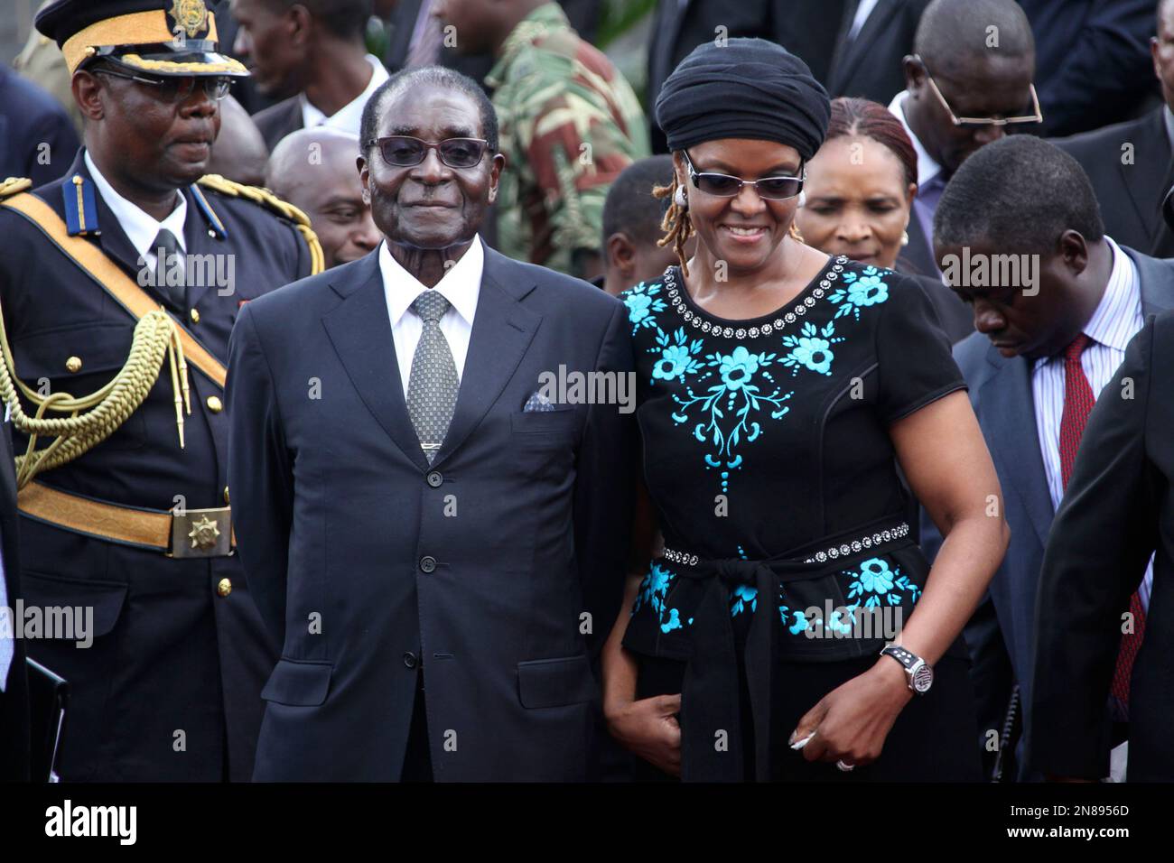 Zimbabwean President Robert Mugabe, left, and his wife Grace attend the ...
