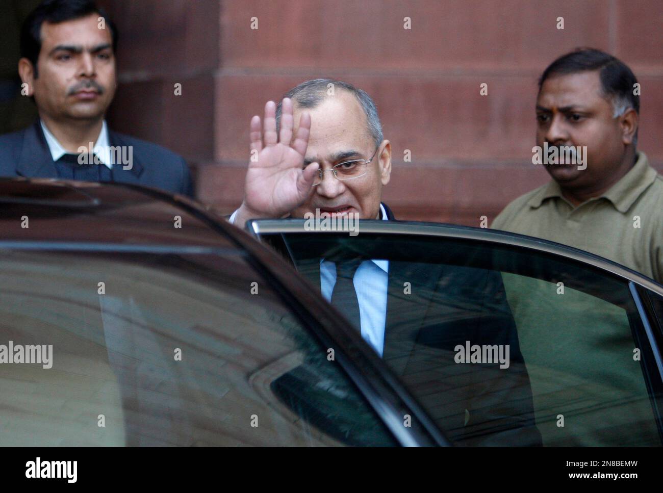 Pakistan High Commissioner to India Salman Bashir waves to the media outside the Indian External ...