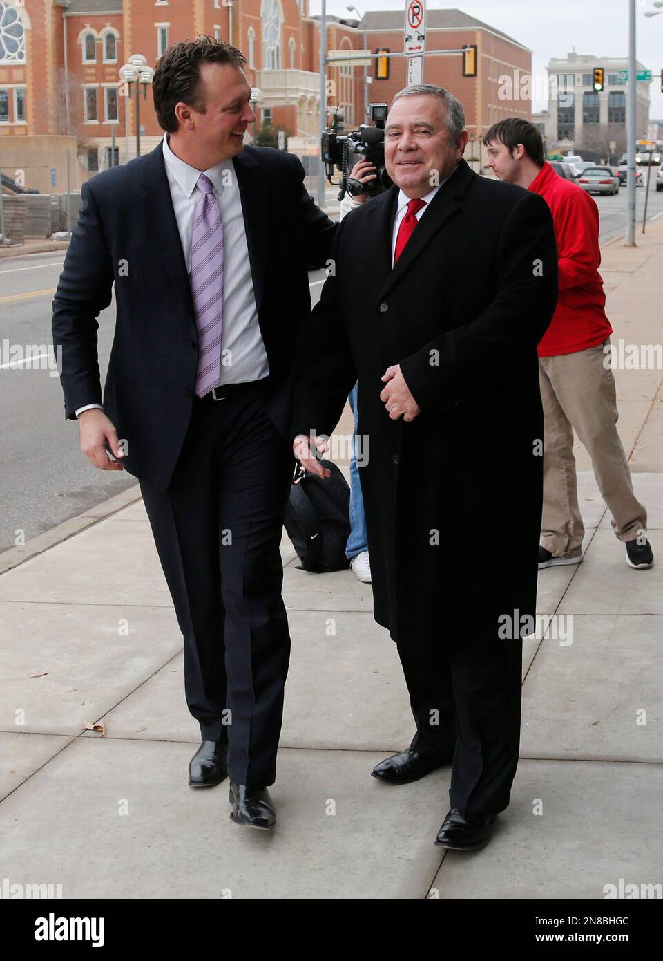 Former Oklahoma Senate President Pro-Tem Mike Morgan, right, walks with ...