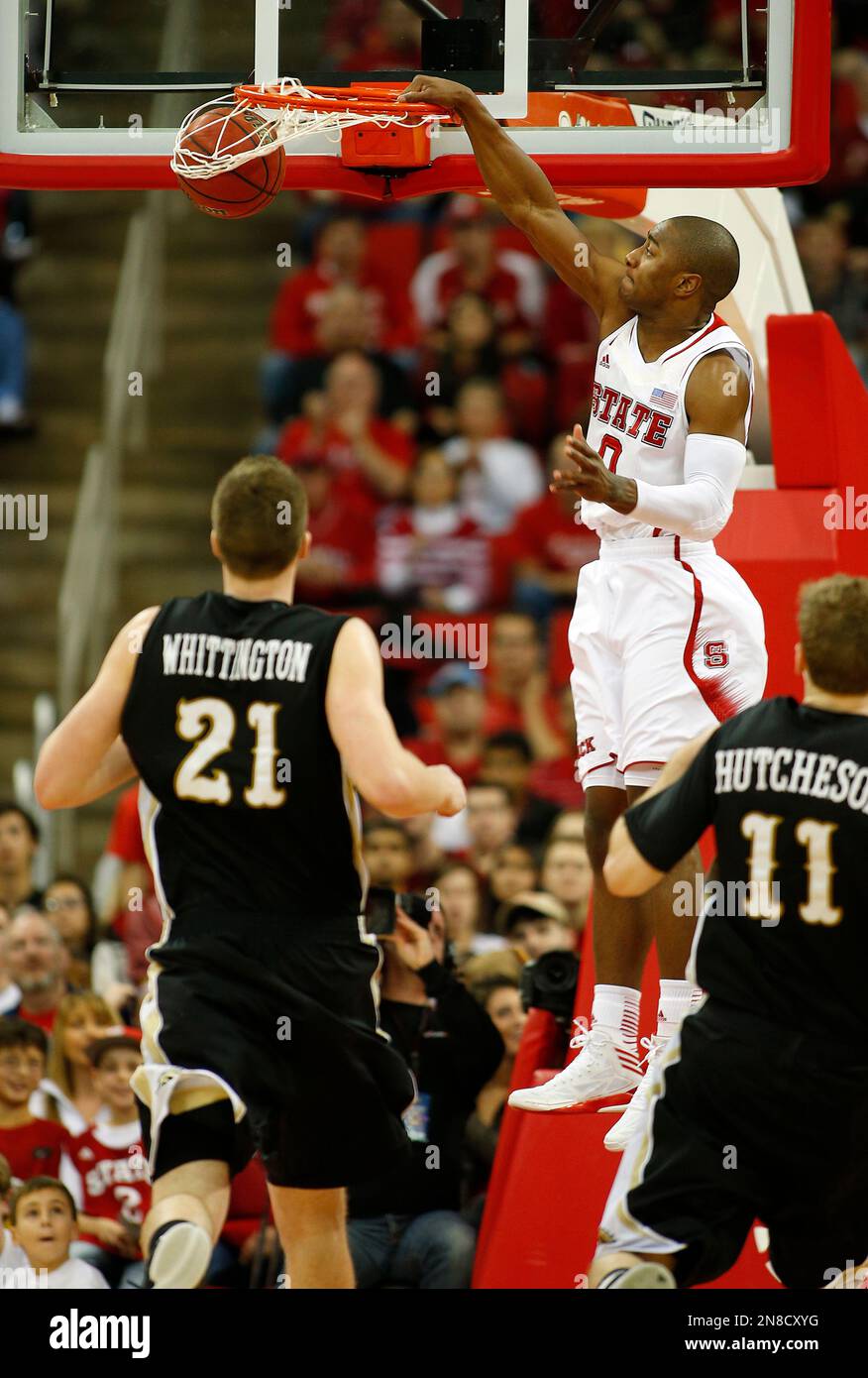 North Carolina State's Rodney Purvis (0) dunks as he gets to the basket ...