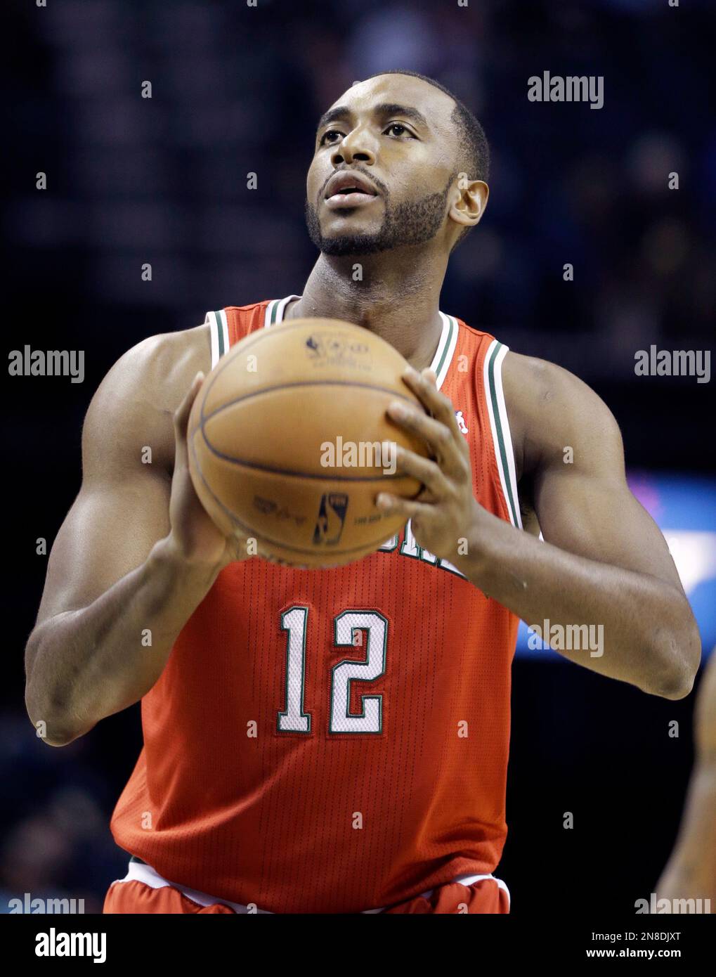 Milwaukee Bucks forward Luc Mbah a Moute, of Cameroon, attempts a free ...