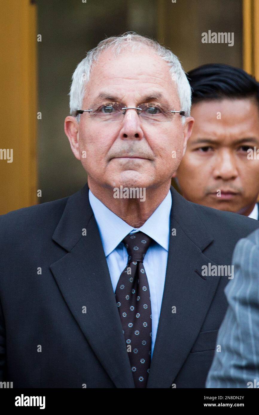 FILE - In this June 29, 2012 file photo, Peter Madoff, leaves Federal ...
