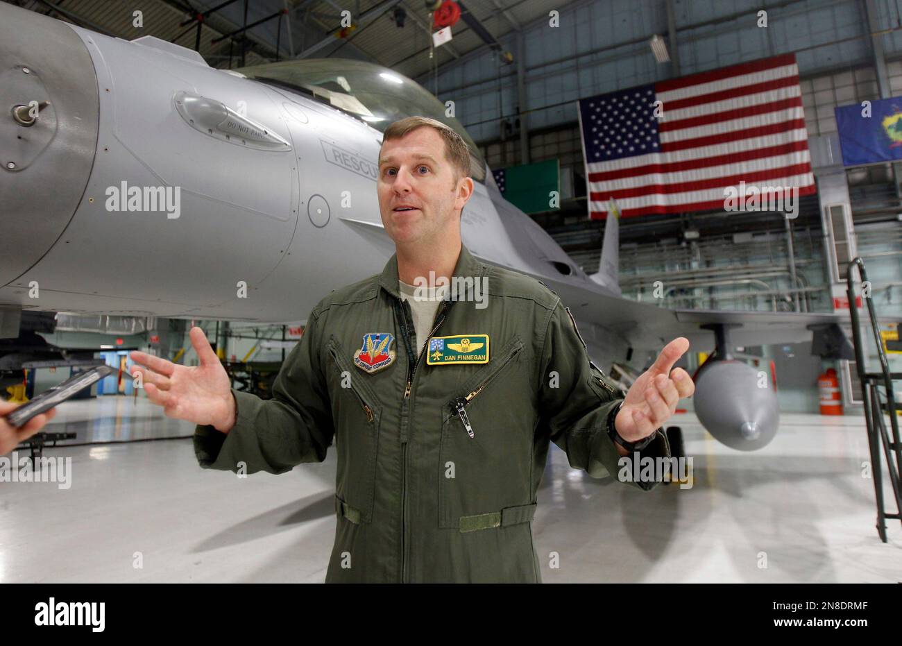 Lt. Col. Dan Finnegan is interviewed by an F-16 fighter plane on Monday ...
