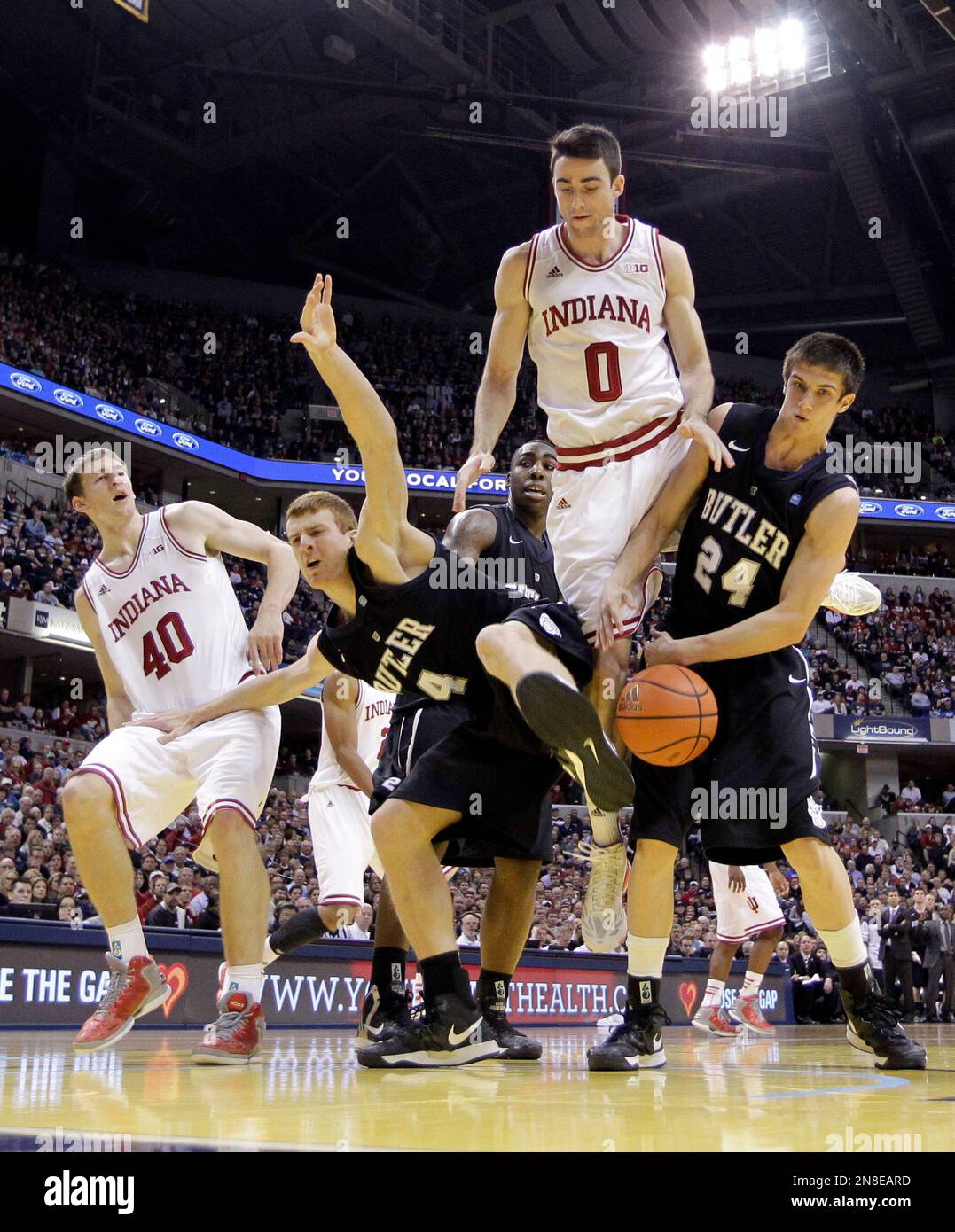 Indiana forward Will Sheehey (0) comes down on Butler forward Erik ...
