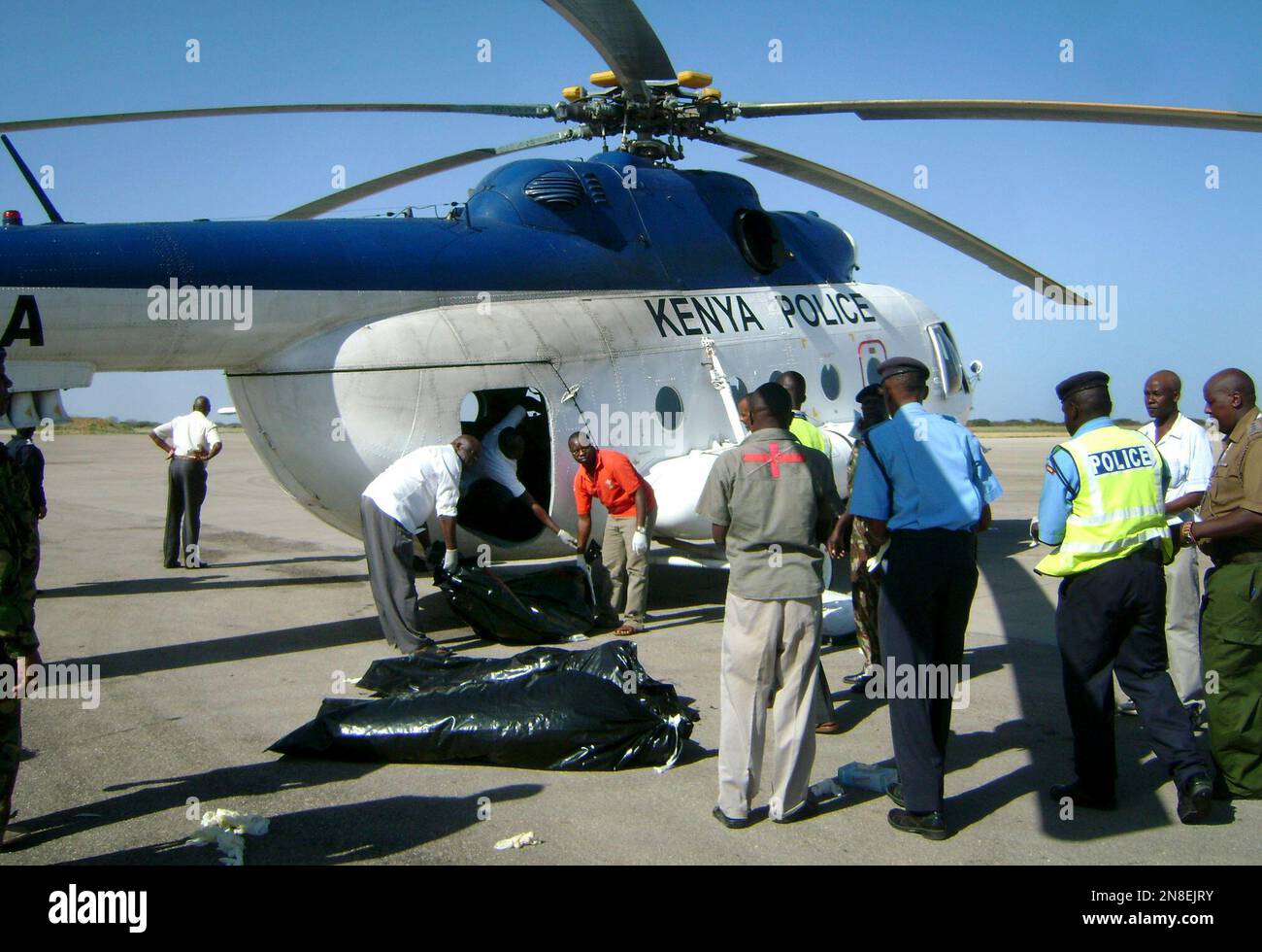 FILE - In this Thursday, Jan. 12, 2012 file photo, Kenyan police load ...