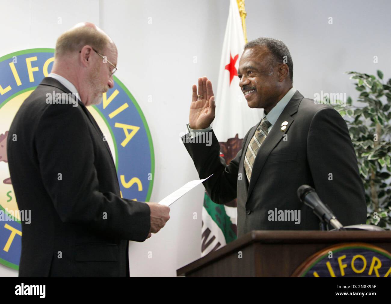 Retired Marine Corp Major General Anthony Jackson, right, takes the ...