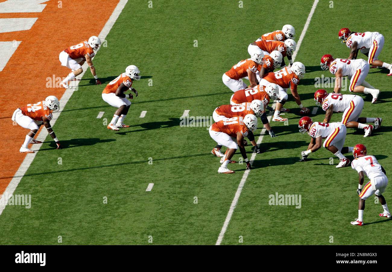 Texas runs their first offense play in the wishbone formation in honor ...