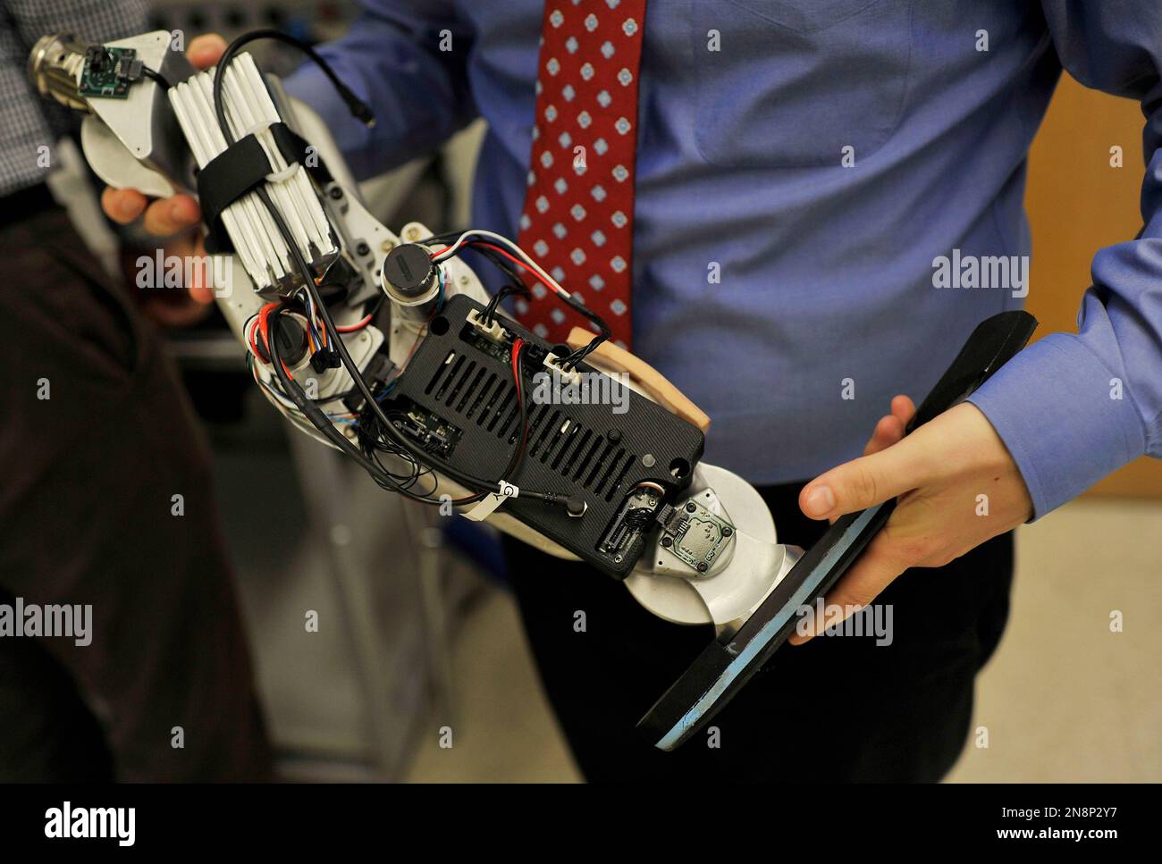 Dr. Levi Hargrove holds an experimental "bionic" prosthetic leg at the ...