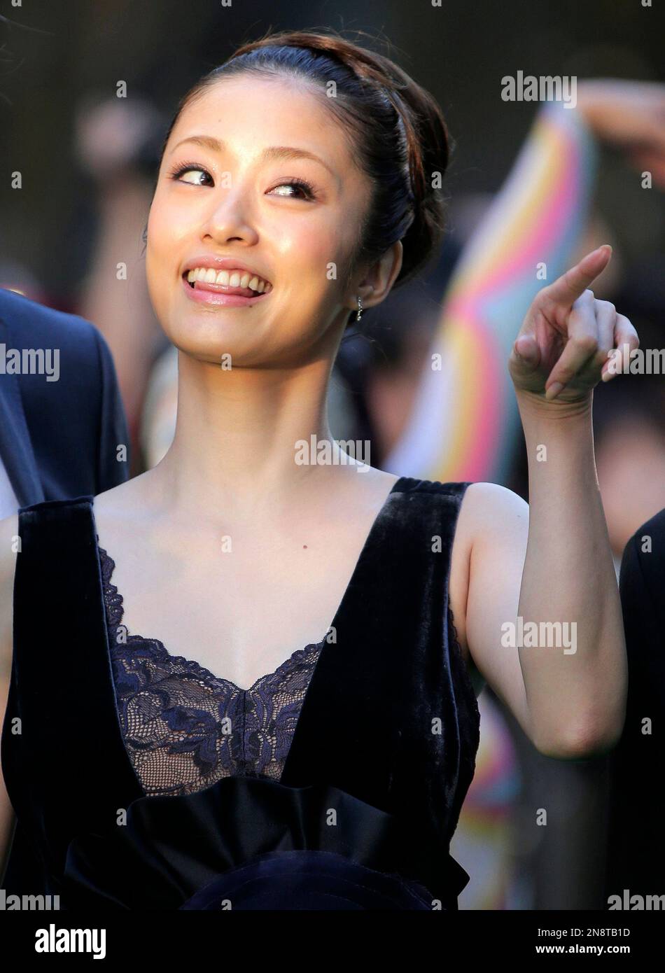 Japanese actress Aya Ueto smiles upon arrival at the opening of the ...