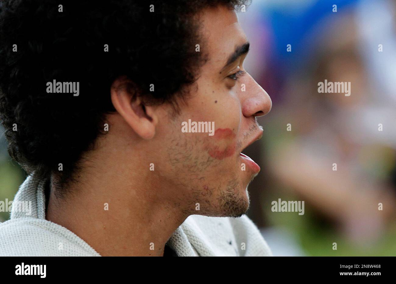 In this Oct. 11, 2012 photo, Ernest English sports lipstick from a kiss ...