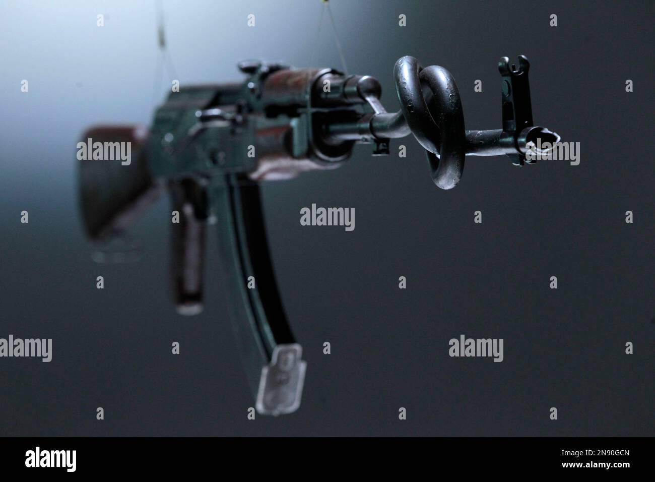 An interpretation of an AK-47 assault rifle by British artists Tim ...