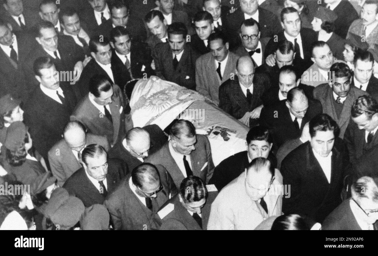 The casket bearing the body of Eva Peron is carried into the Labor ...