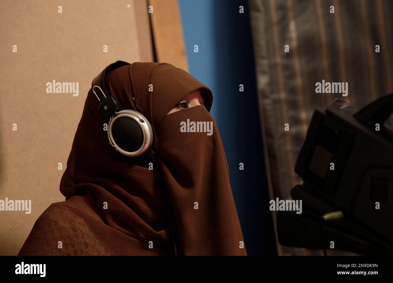 Heba Seraj films a segment of a Ramadan program at the Maria Channel's ...