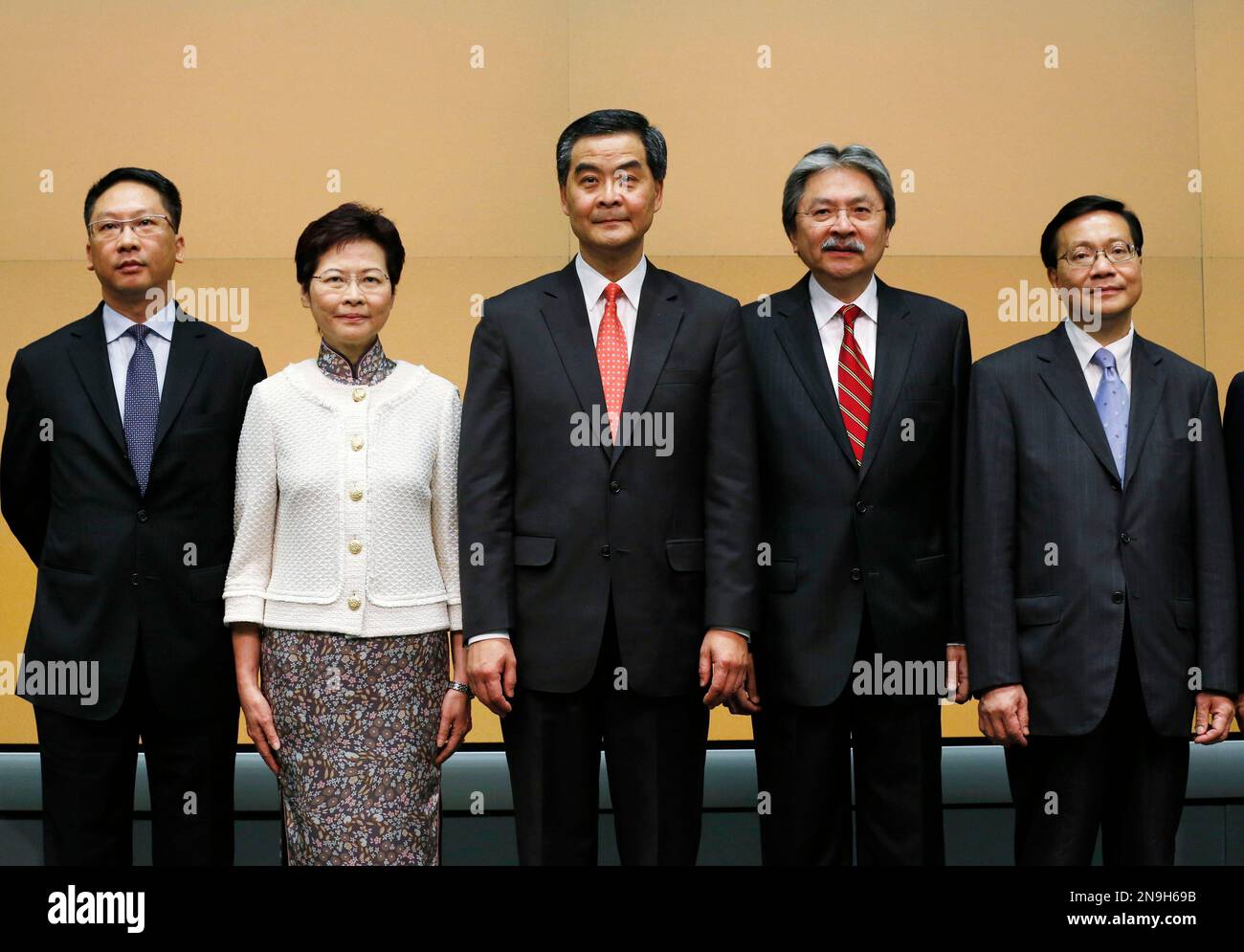 The members of Hong Kong's new cabinet, from left, Secretary for ...